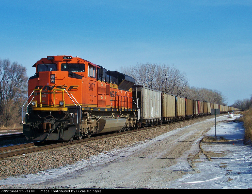 BNSF 9077 DPU on eastbound BNSF loaded coal train